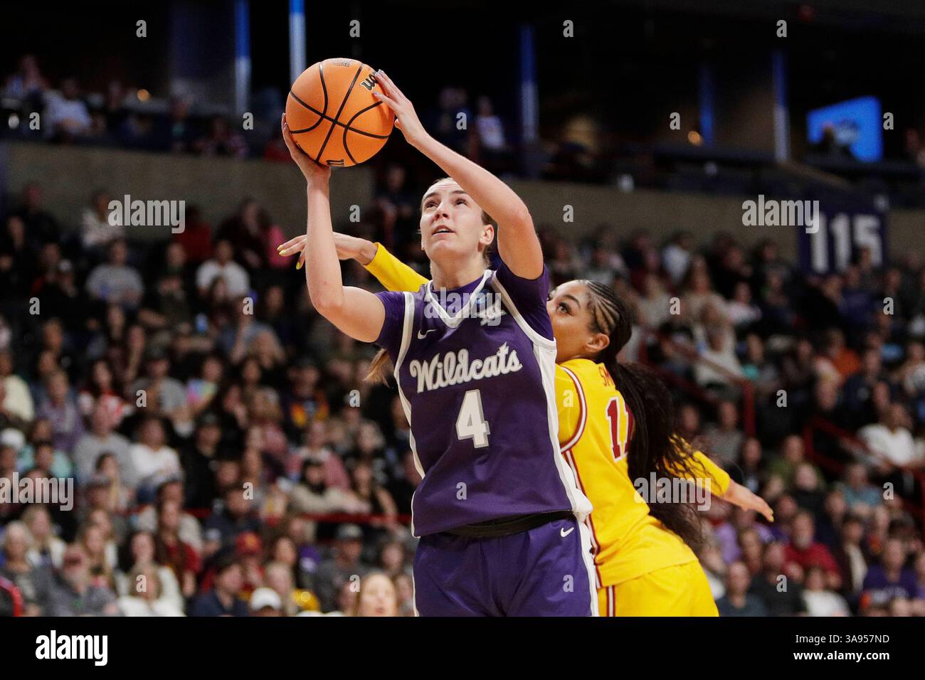 Kansas State guard Serena Sundell (4) shoots while pressured by ...