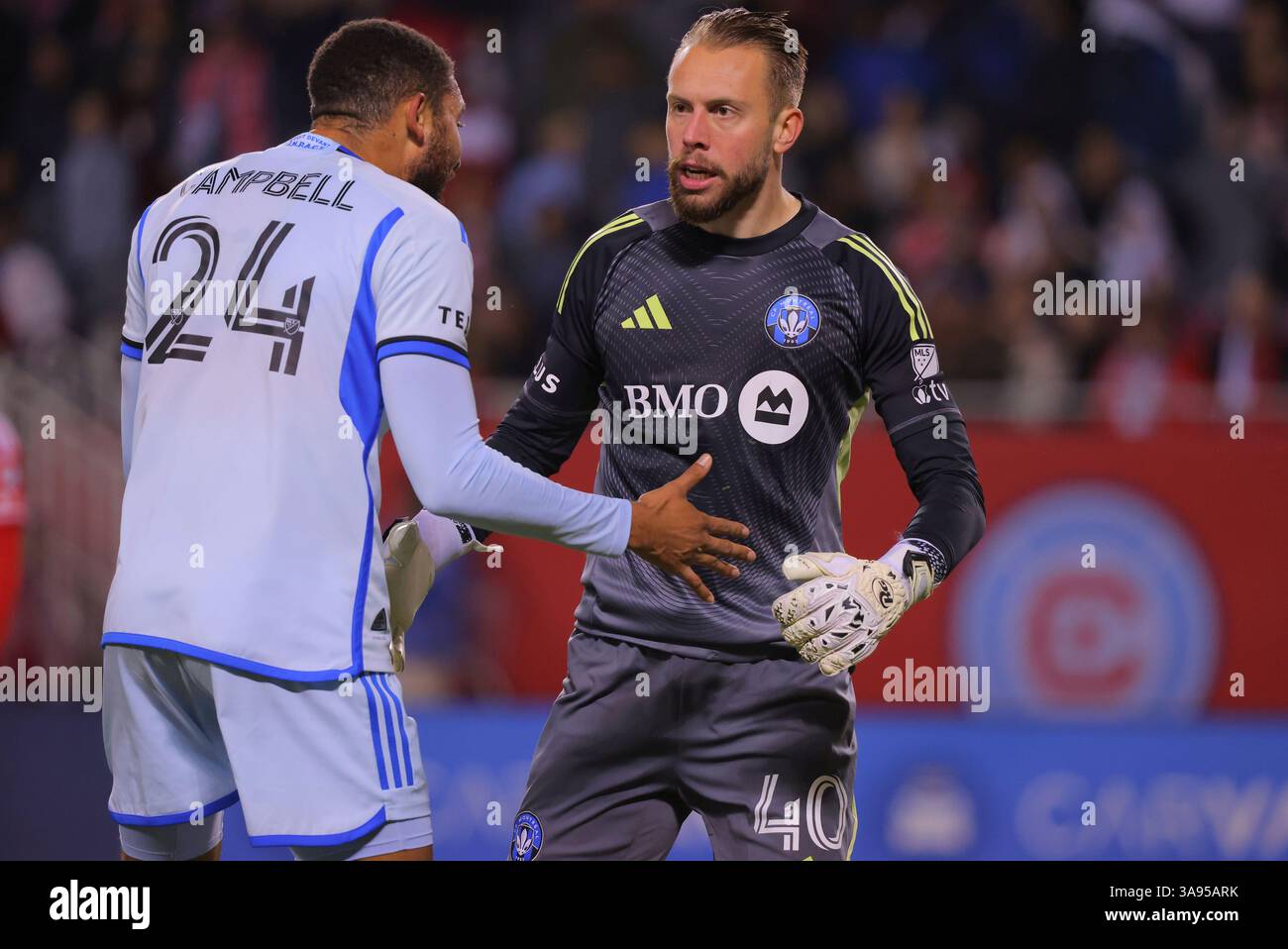 CF Montréal defender George Campbell (24) and goalkeeper Jonathan ...