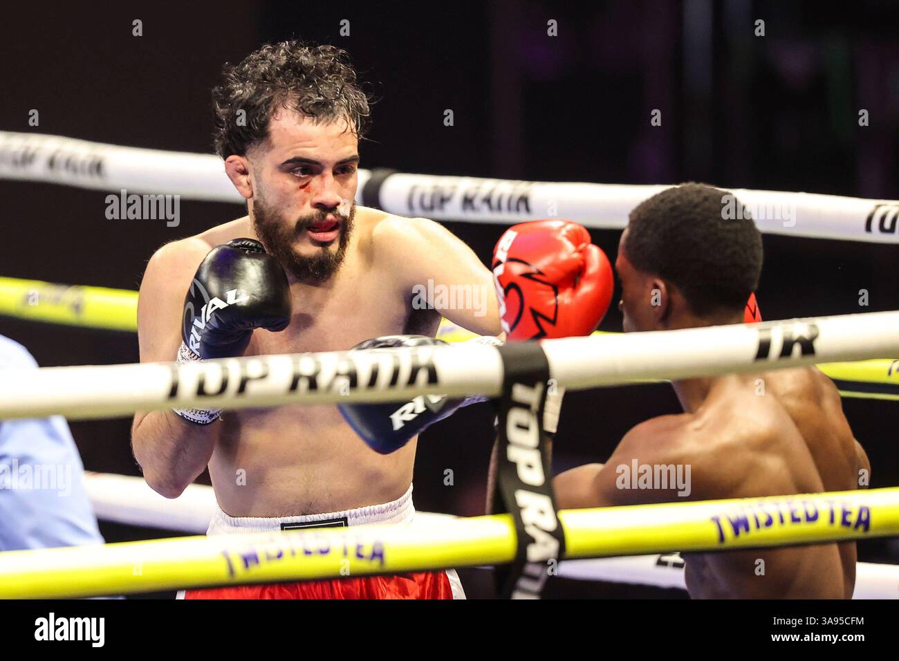 March 29, 2025: (L-R) Bantamweight Miguel Guzman looks for an opening ...