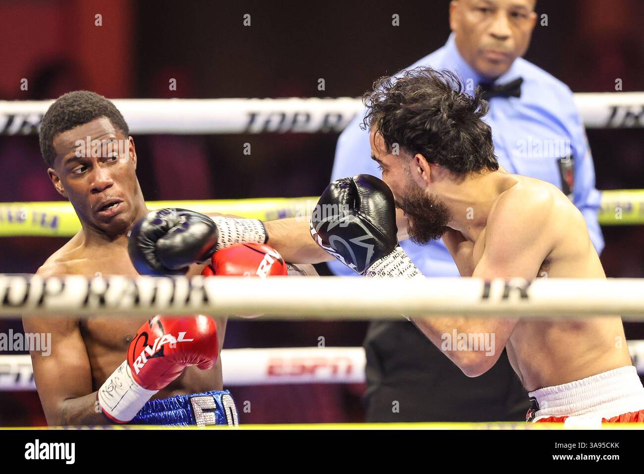 March 29, 2025: (L-R) Bantamweight Emmanuel Chance slips a punch thrown ...
