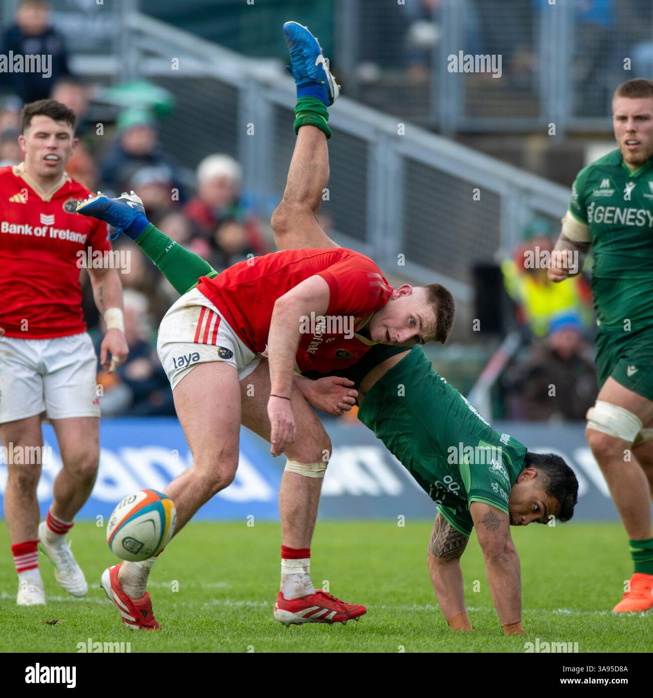 Josh Ioane of Connacht and Ben O'Connor of Munster in action during the ...
