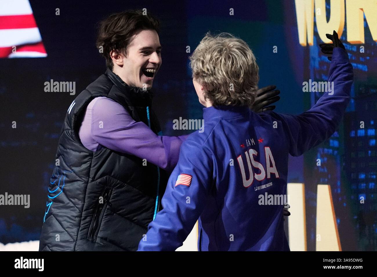 Silver medalist Mikhail Shaidorov, of Kazakhstan, left, celebrates with ...