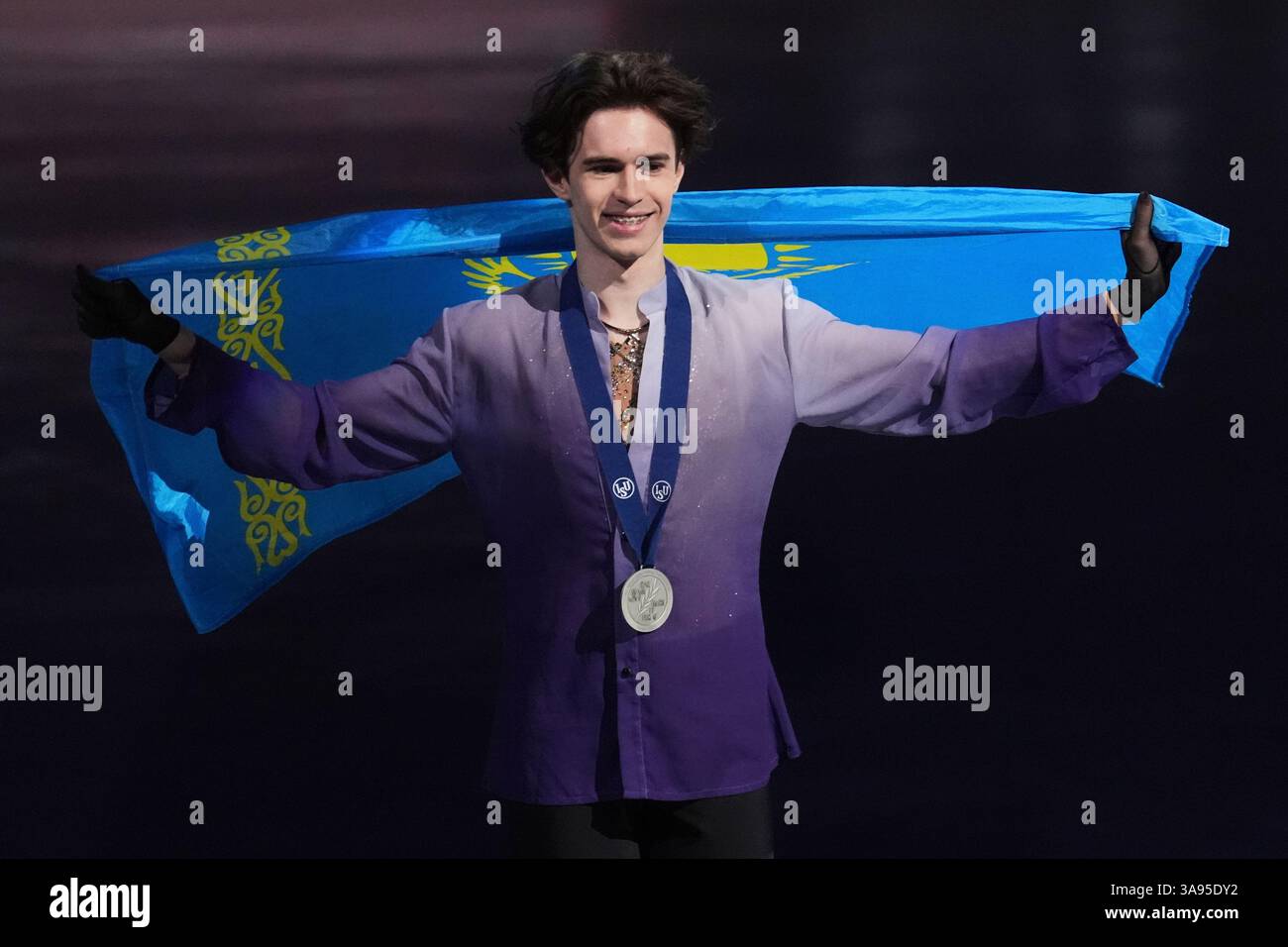 Silver medalist Mikhail Shaidorov, of Kazakhstan, poses for photos ...