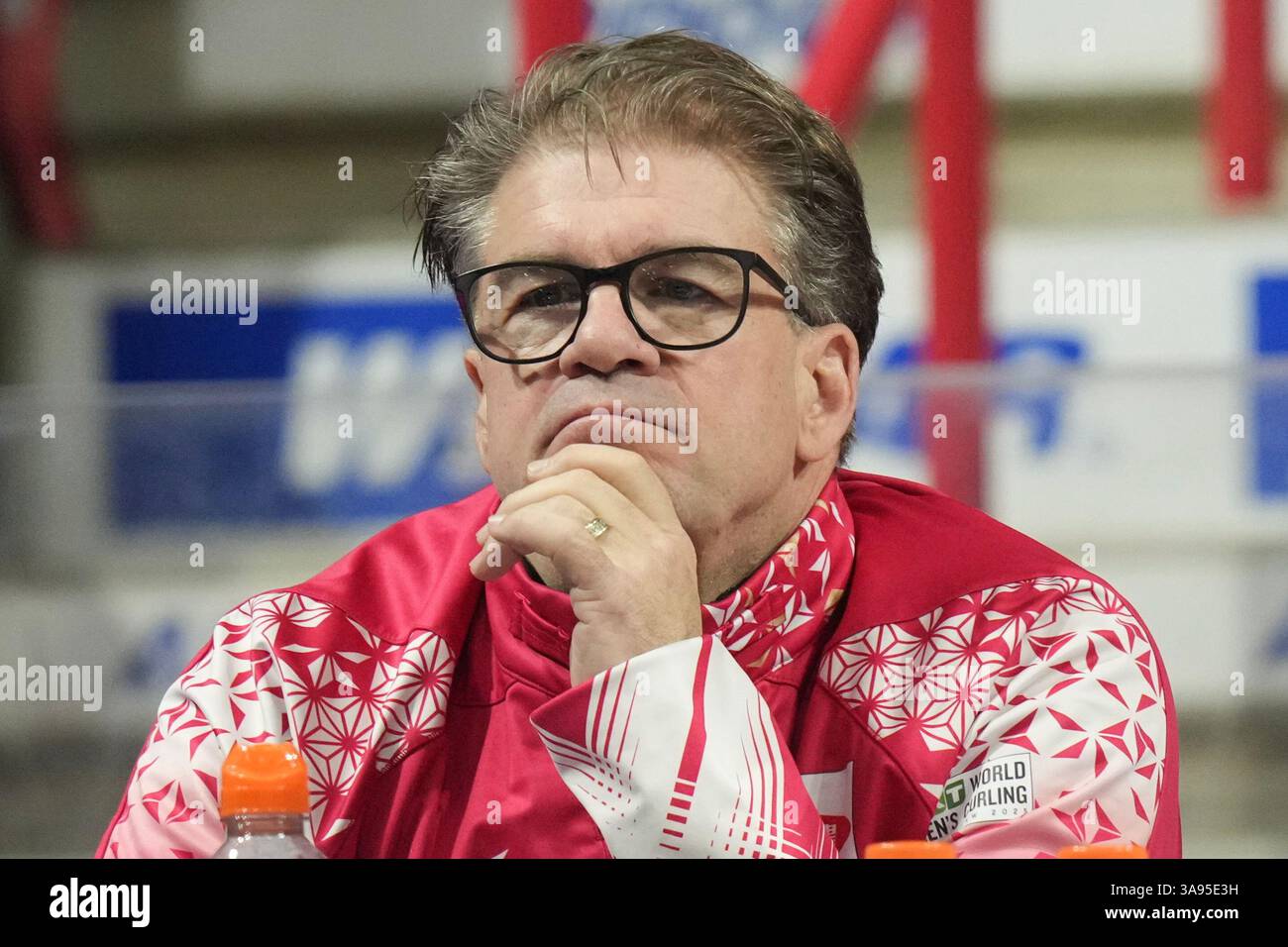 Japan's coach Bob Ursel watches his team's match against Canada at the ...