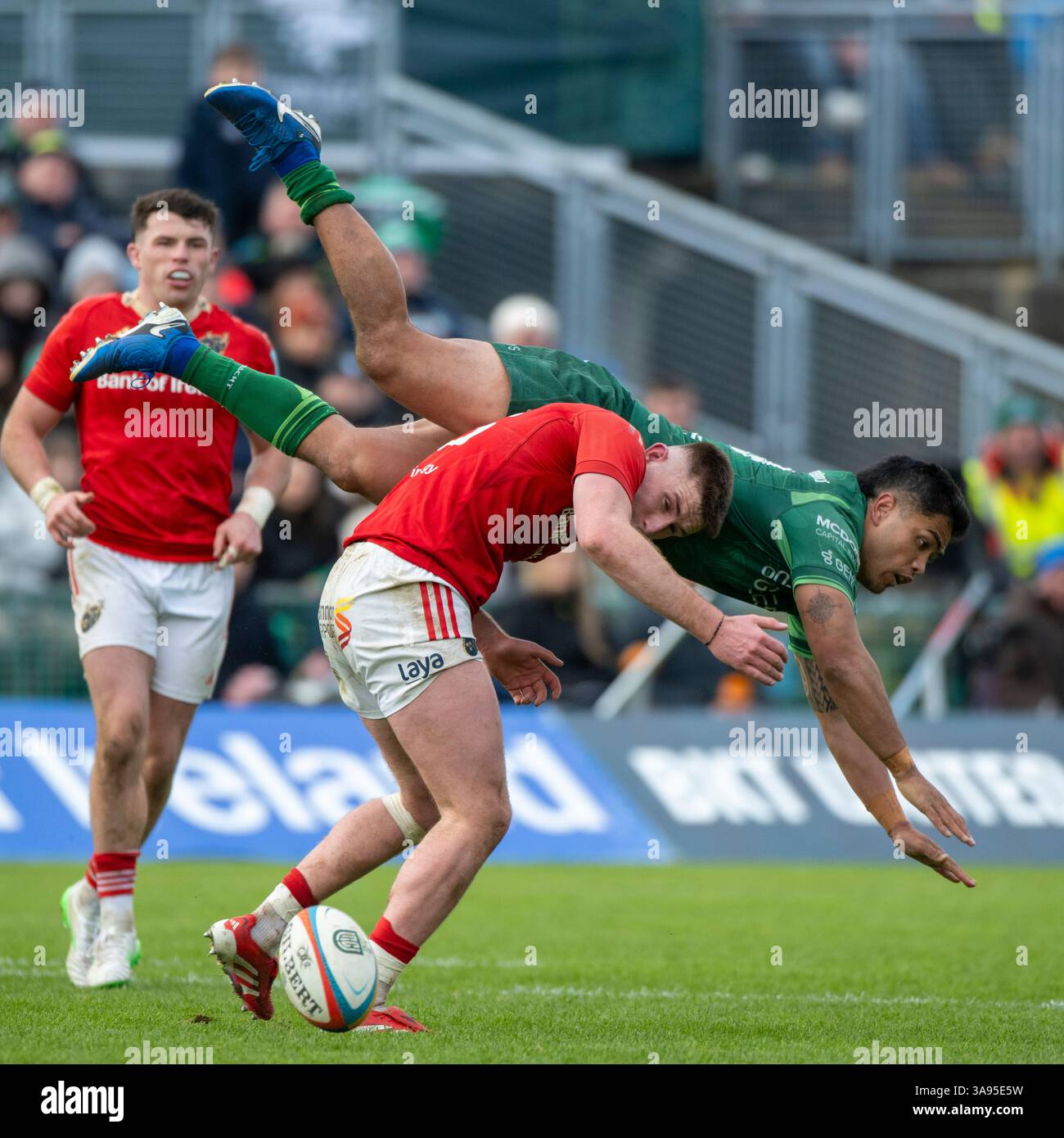 Castlebar, Ireland. 30th Mar, 2025. Josh Ioane of Connacht and Ben O ...