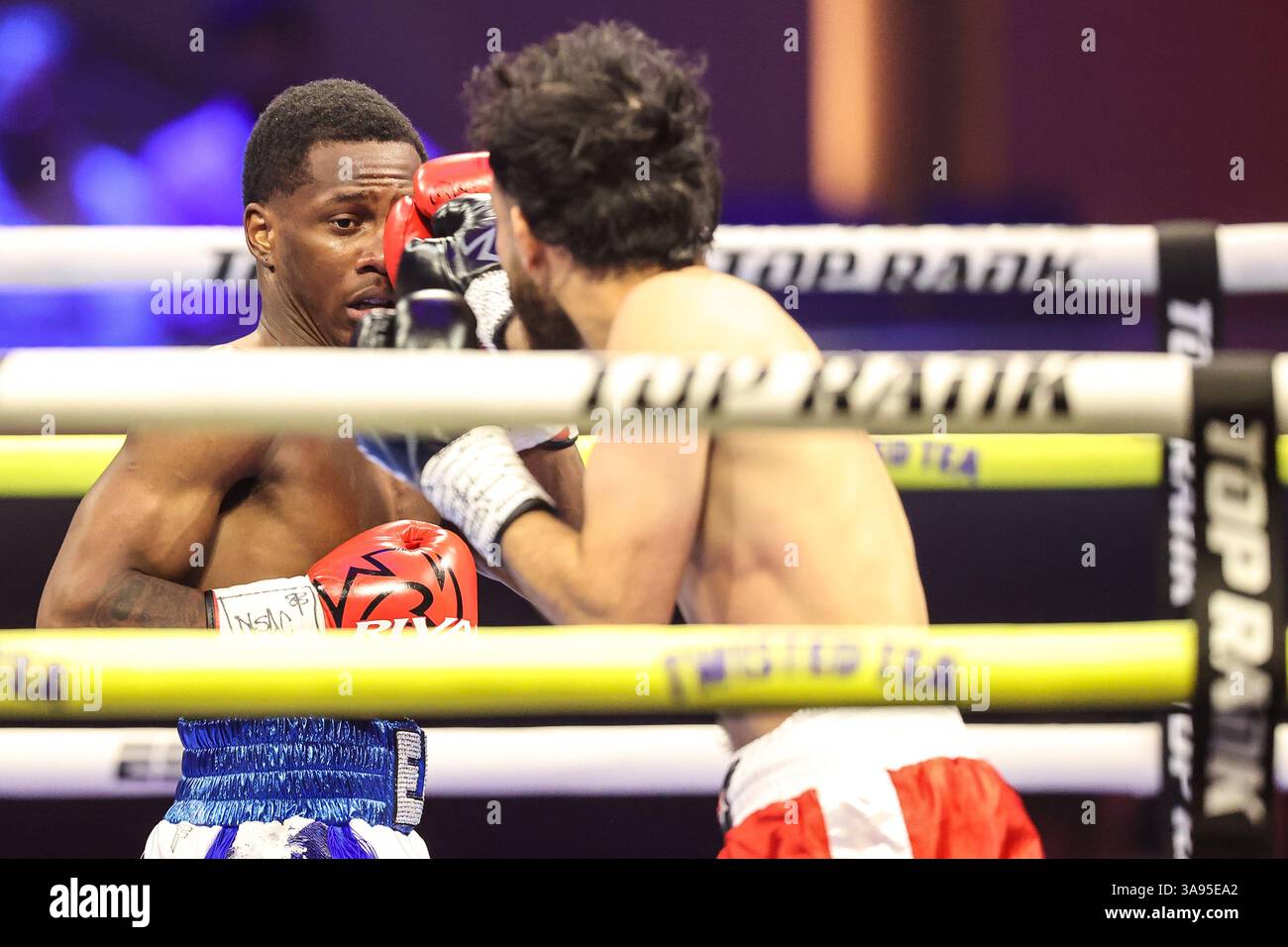 March 29, 2025: (L-R) Bantamweight Emmanuel Chance slips a punch from ...