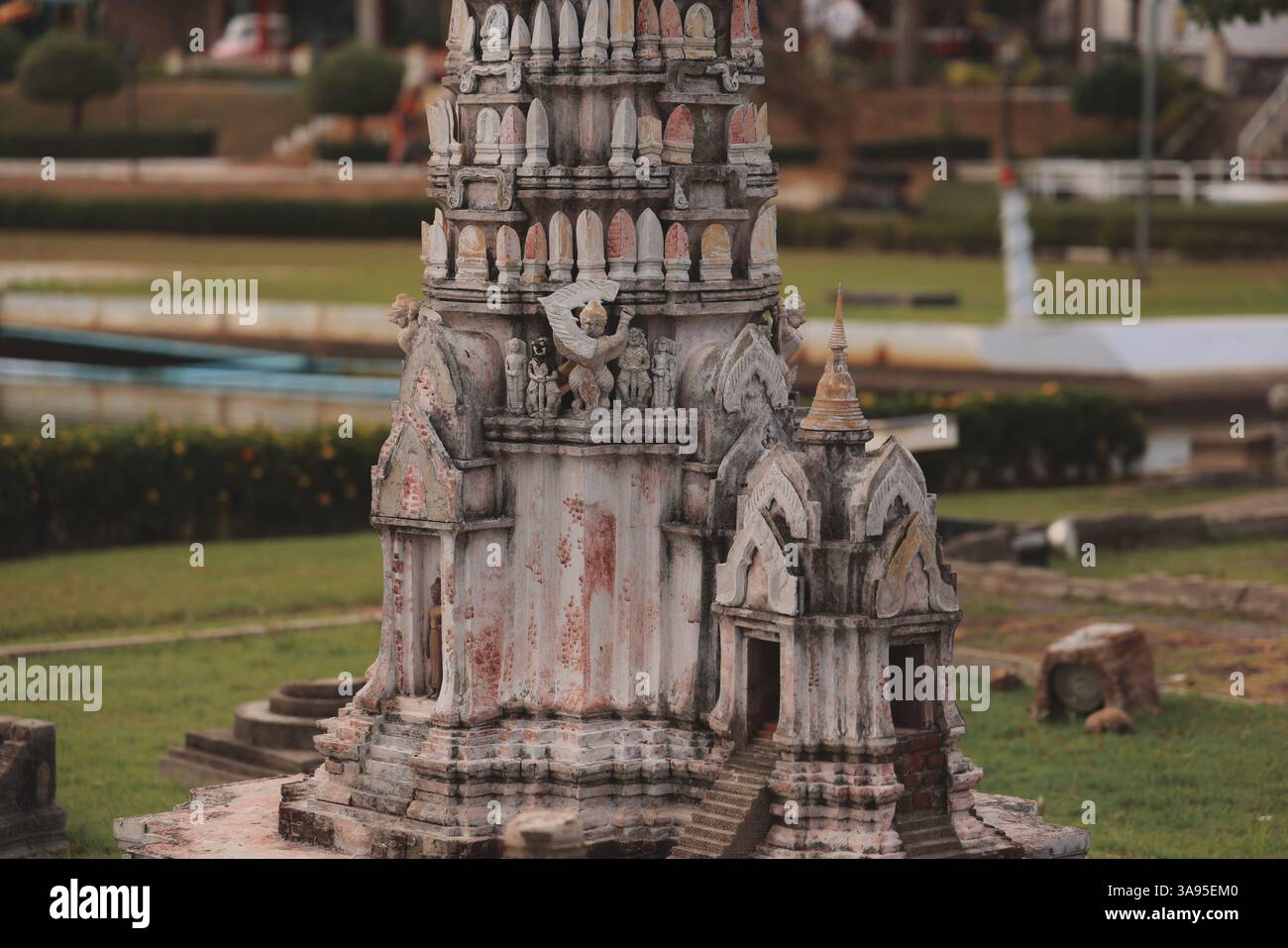 An Intricate Miniature Temple Structure Graced by Lush Greenery and ...