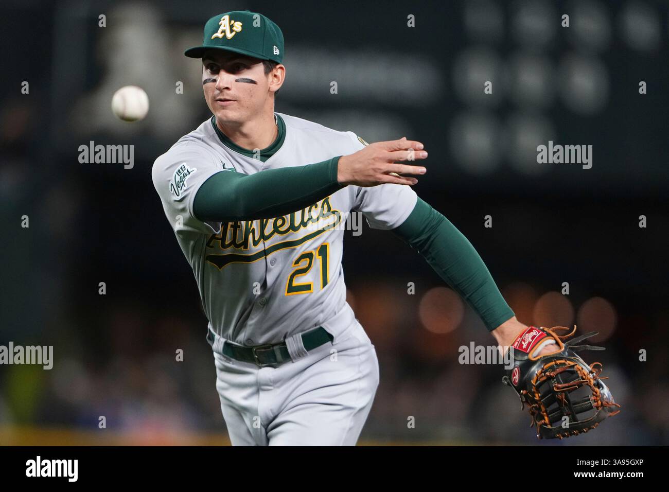 Athletics first baseman Tyler Soderstrom makes a throw during a ...