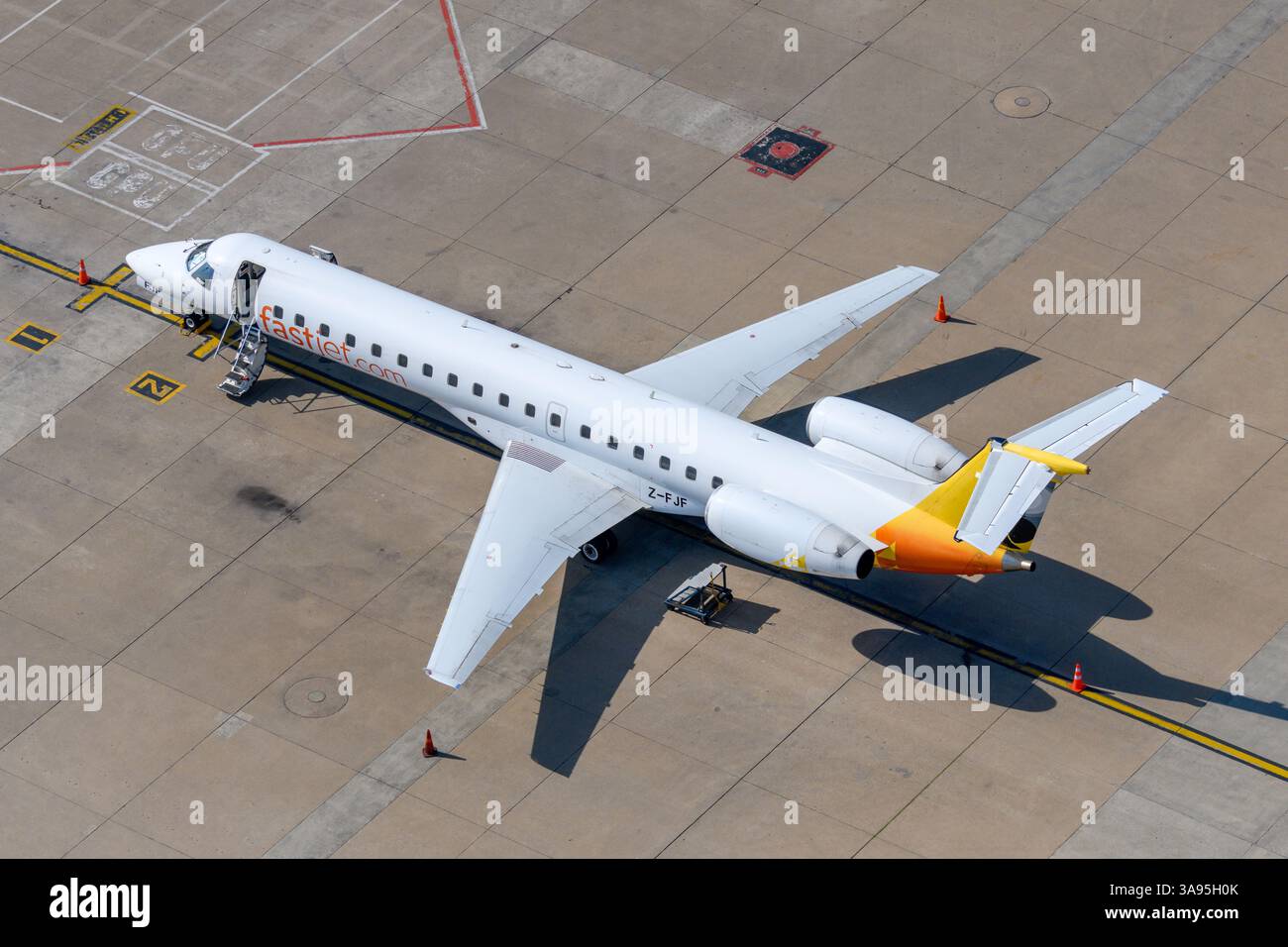 Fastjet Zimbabwe Embraer ERJ 145 parked. Airplane of airline Fastjet ...
