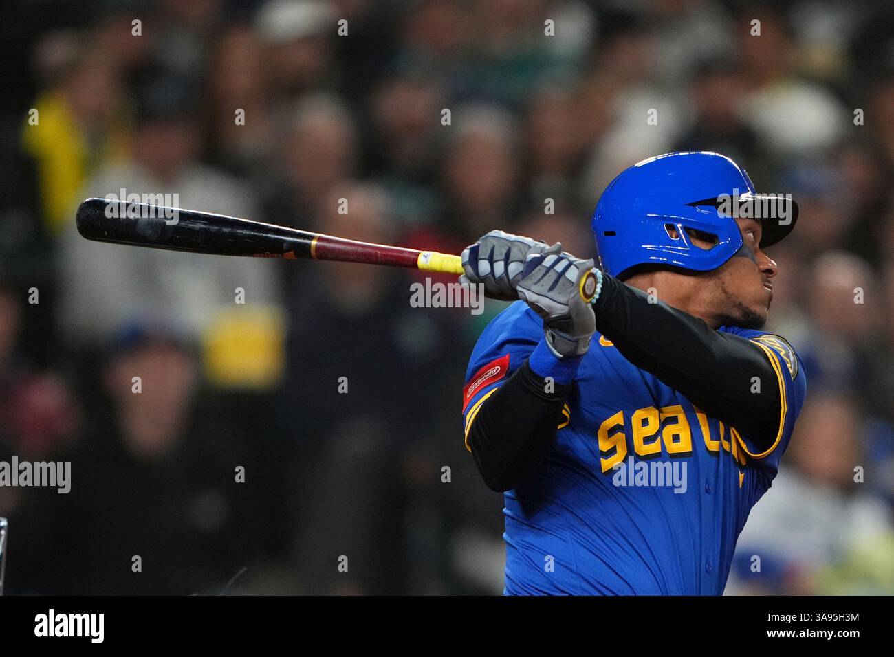 Seattle Mariners' Jorge Polanco follows through during a baseball game ...