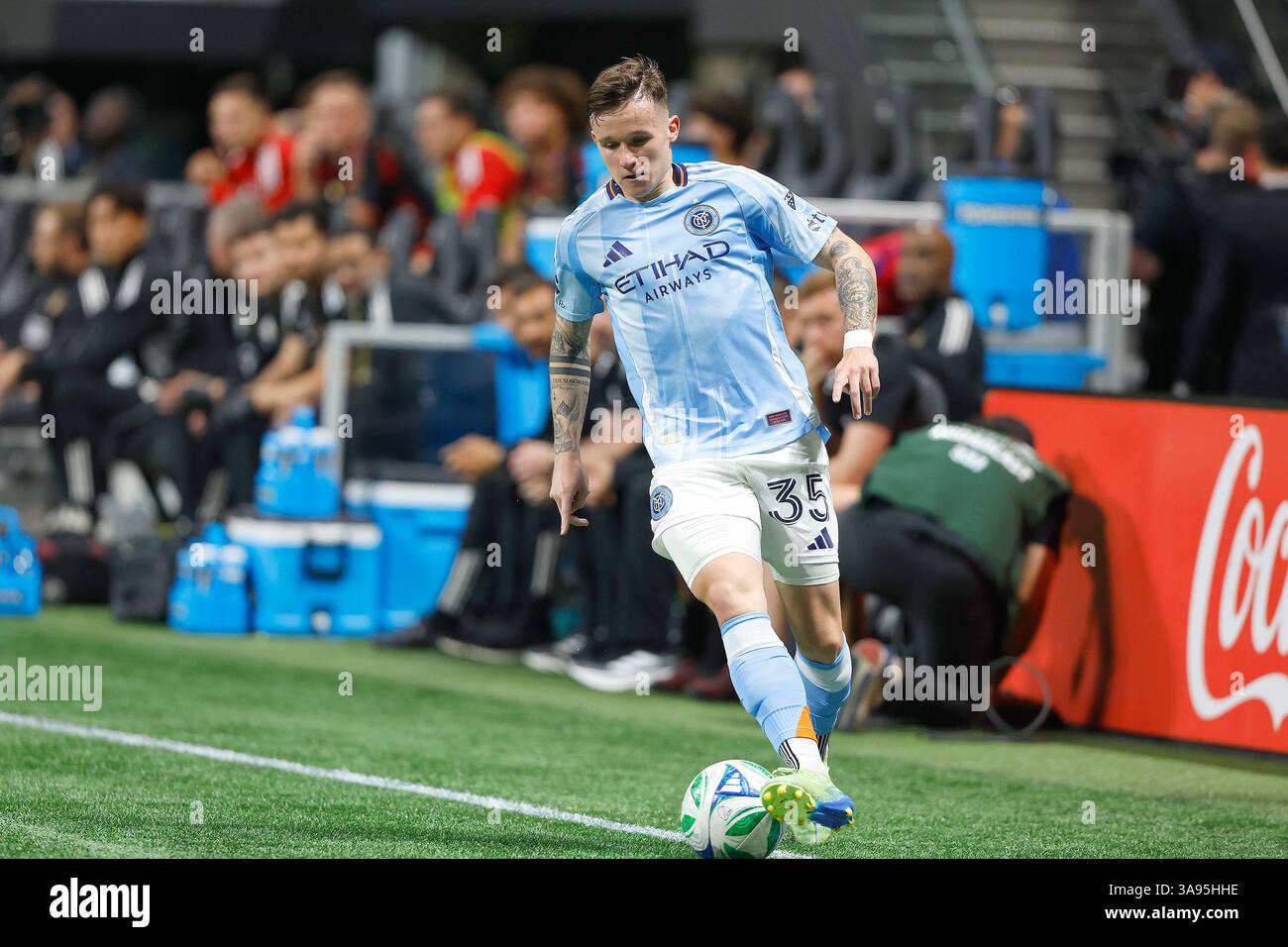 ATLANTA, GA - MARCH 29: Mitja Ilenic #35 of New York City during the ...