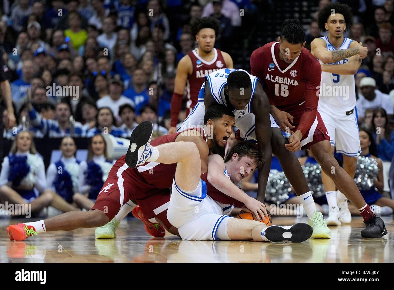 Duke guard Kon Knueppel (7) and center Khaman Maluach (9) battle for a ...
