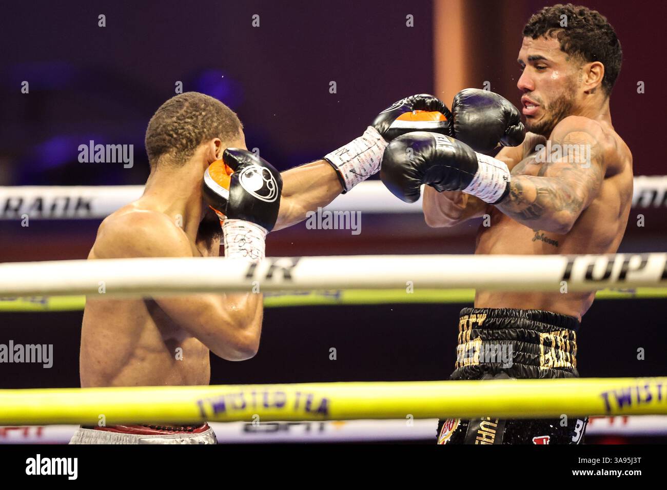 March 29, 2025: (R-L) Welterweight Derrieck Cuevas avoids a punch ...