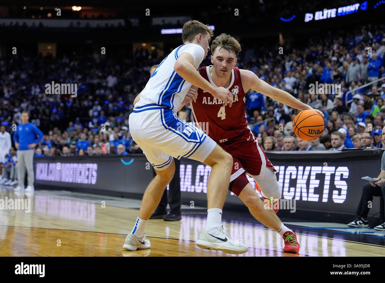 Alabama forward Grant Nelson (4) drives against Duke forward Cooper ...