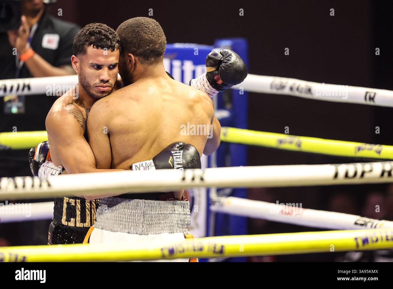 March 29, 2025: (R-L) Welterweight Derrieck Cuevas cliches with Brian ...
