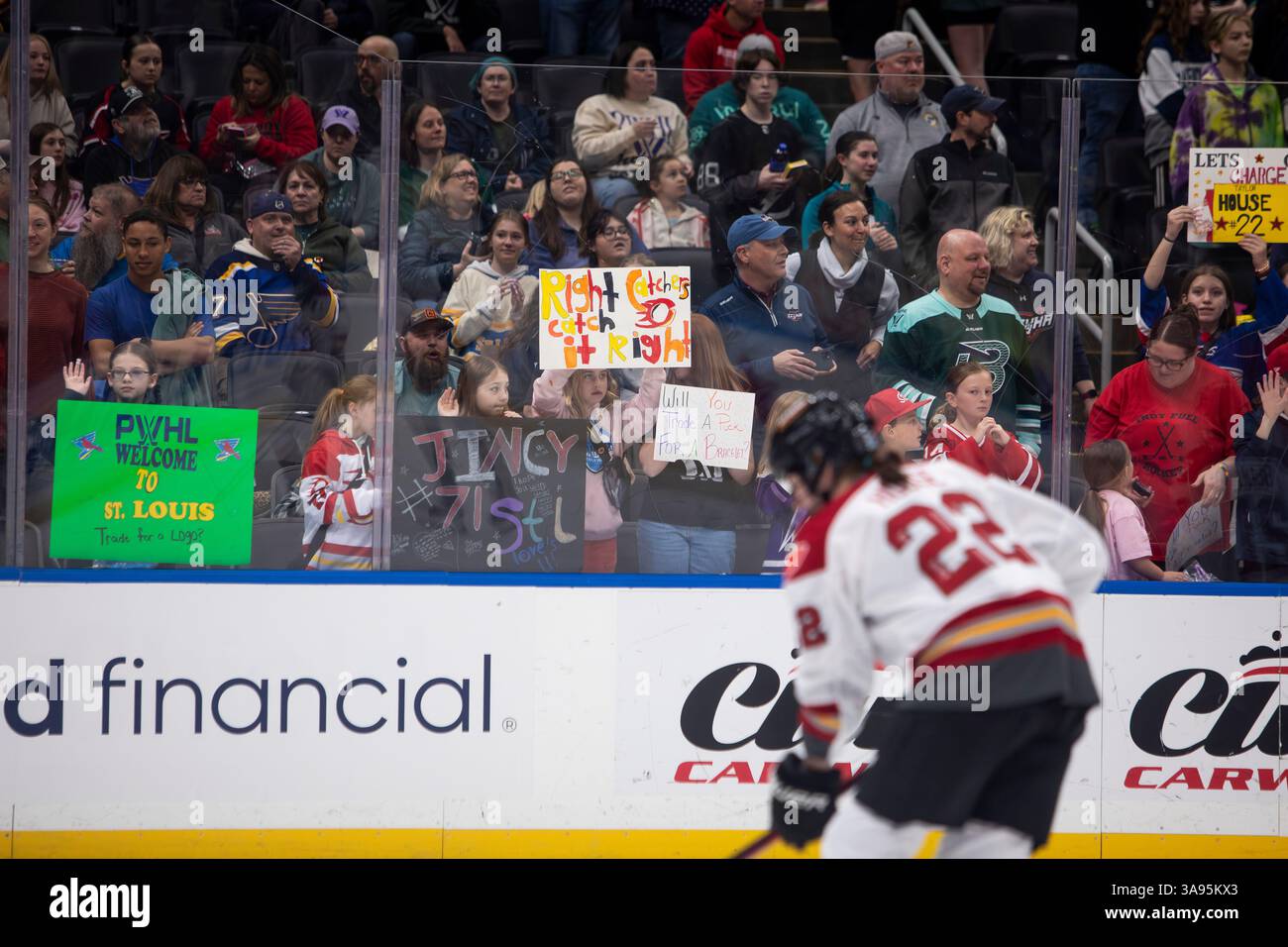 St. Louis, Missouri, USA. 29th March, 2025. Young fans hold up signs ...