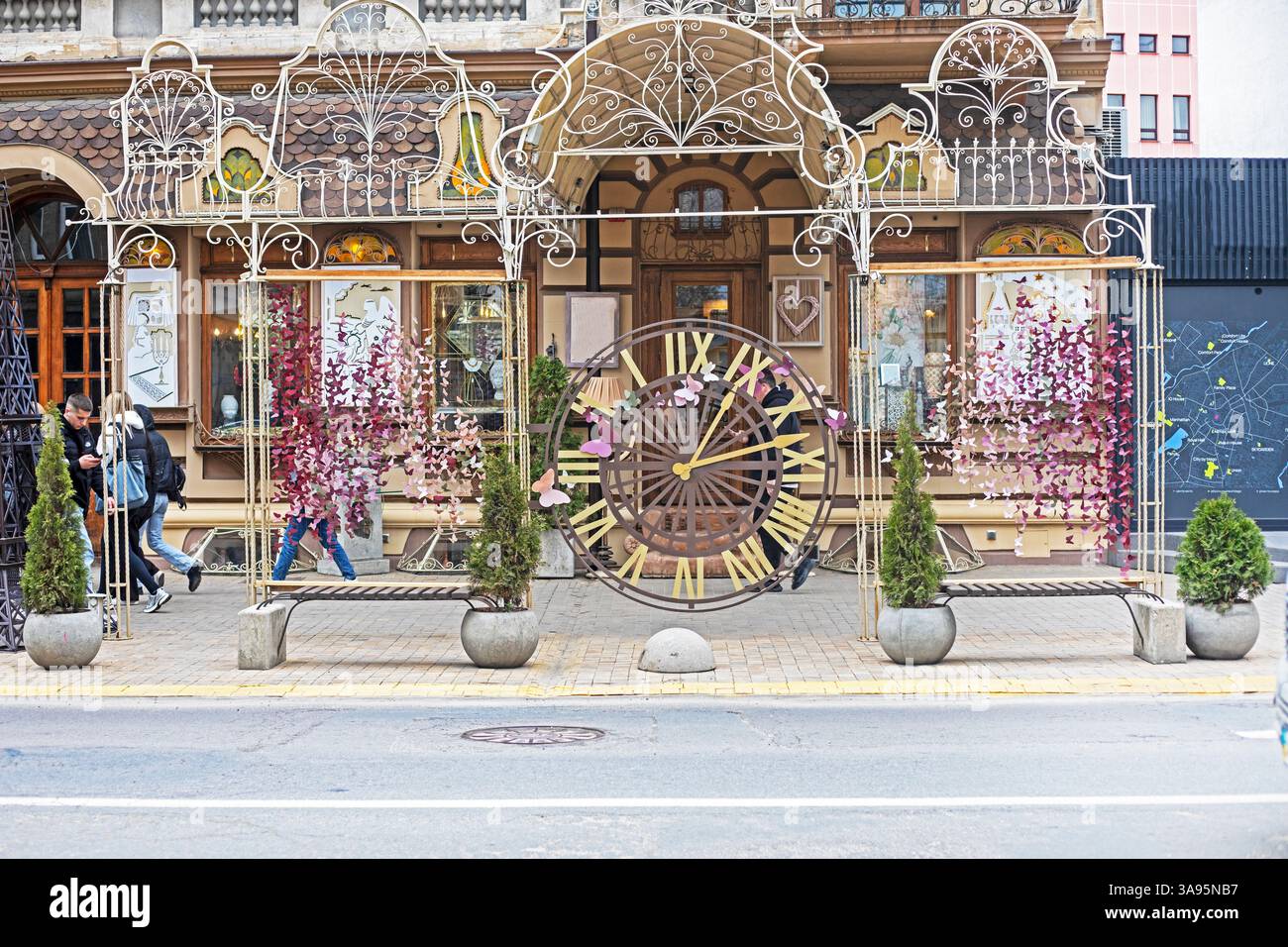 round street clock in the old part of the city. Daylight saving time ...