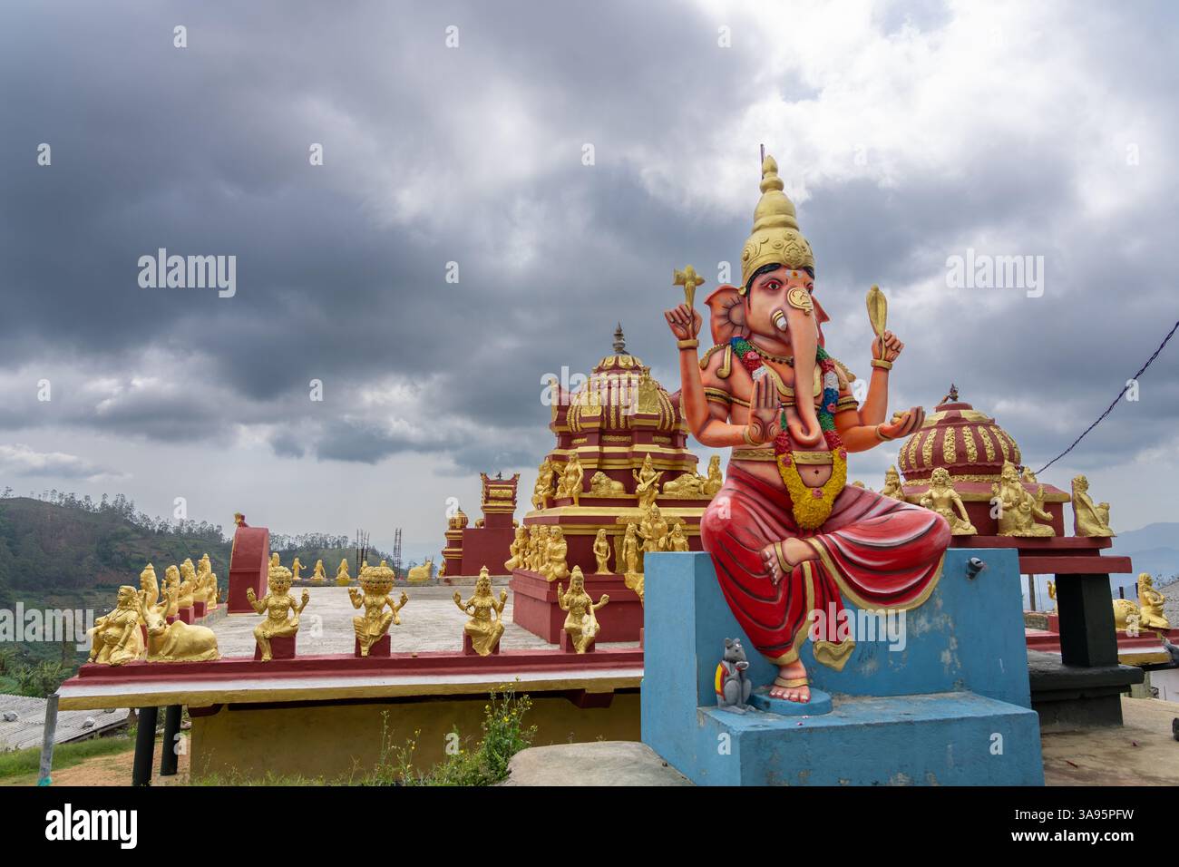 Hindu temple exterior from street in rural area with large Garnesha on ...