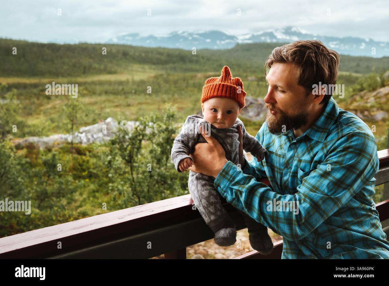 Father playing with baby on terrace family lifestyle, parent with ...