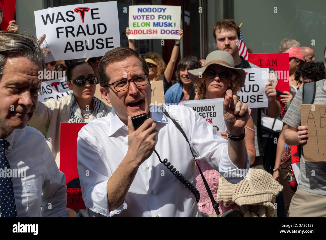 Assemblymember Micah Lasher speaks during a Tesla Takedown rally ...