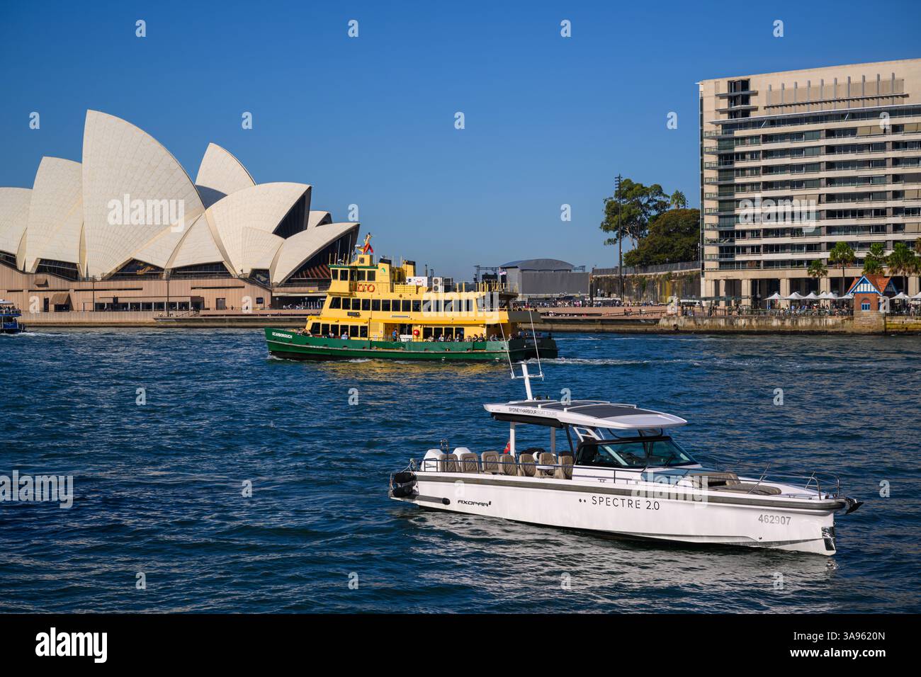Boats sailing past the Sydney Opera House, Circular Quay, Sydney ...