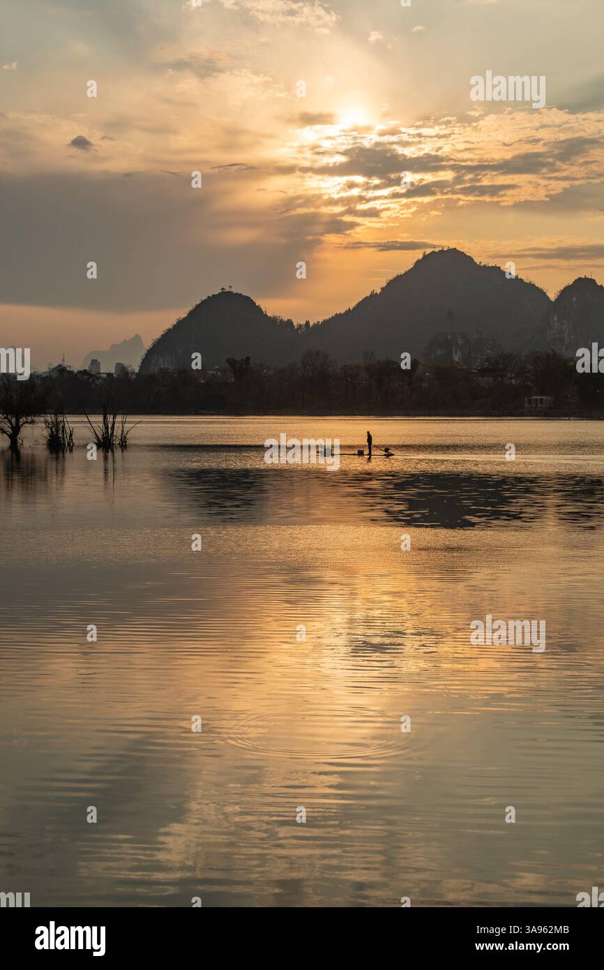 Celestial Dawn on Li River: Golden Mist Rising Between Emerald Karst ...