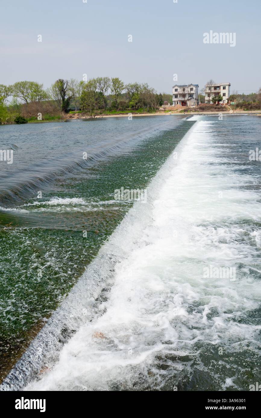 Cascading Serenity: A Rural Waterfall's Gentle Flow Through Lush ...