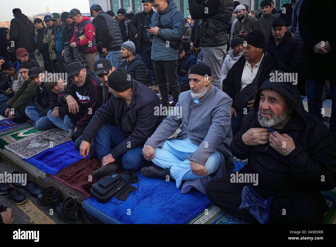 Muslim worshippers attend mass Eid al-Fitr prayer outside of the Moscow ...