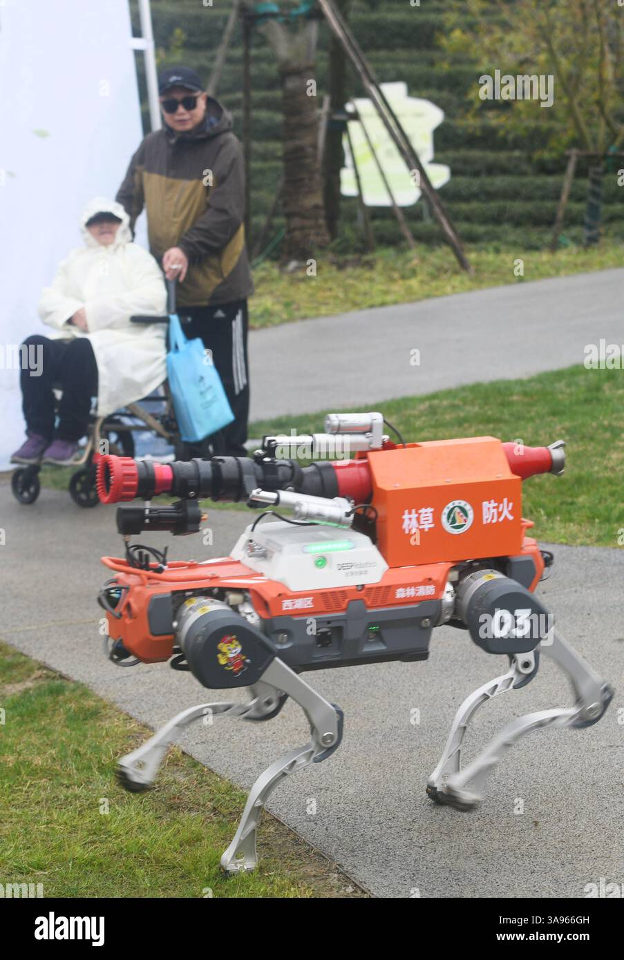 A forest fire fighting intelligent robot dog is displayed at Longwu tea ...