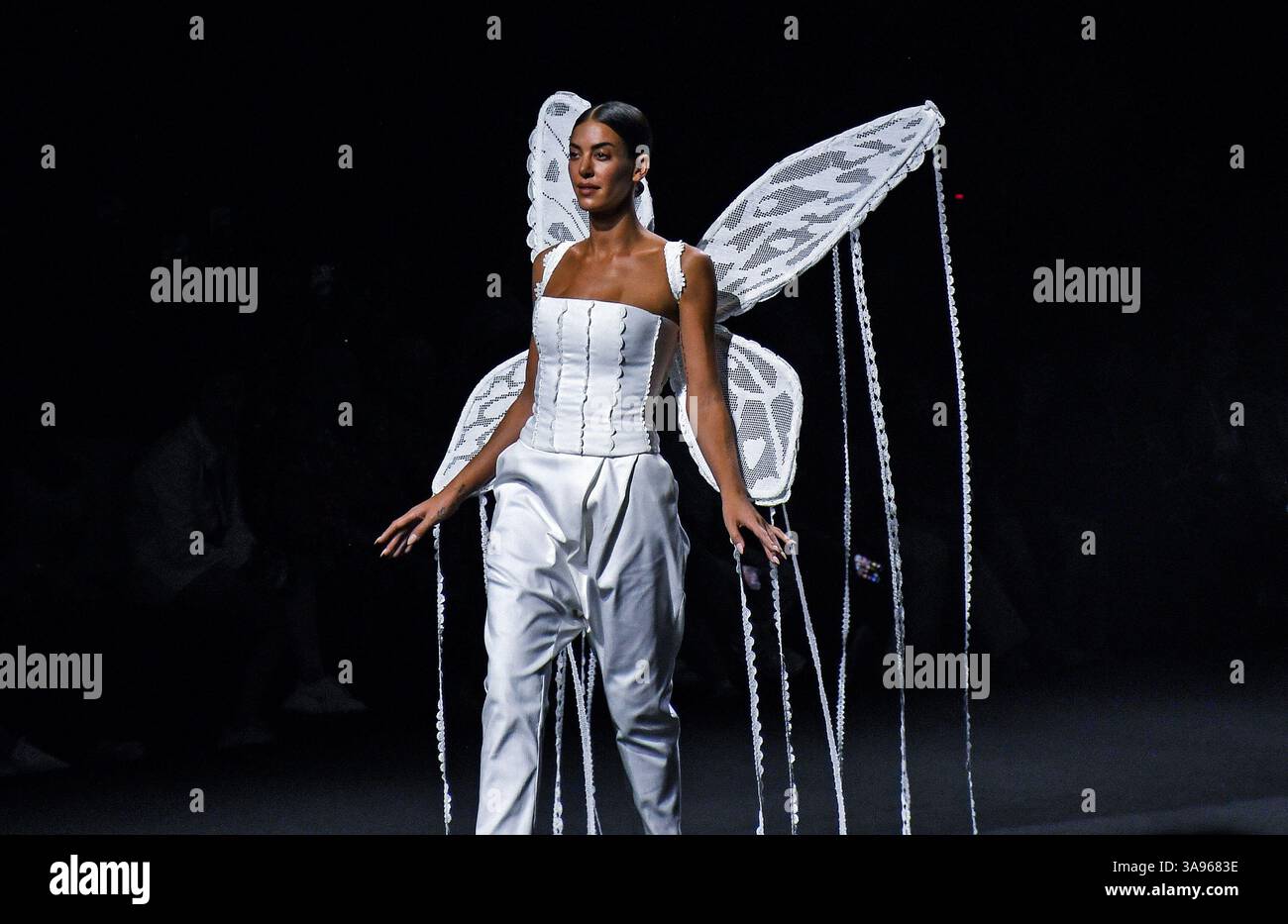 Mumbai, India. 29th Mar, 2025. A model wearing creation by designer ...