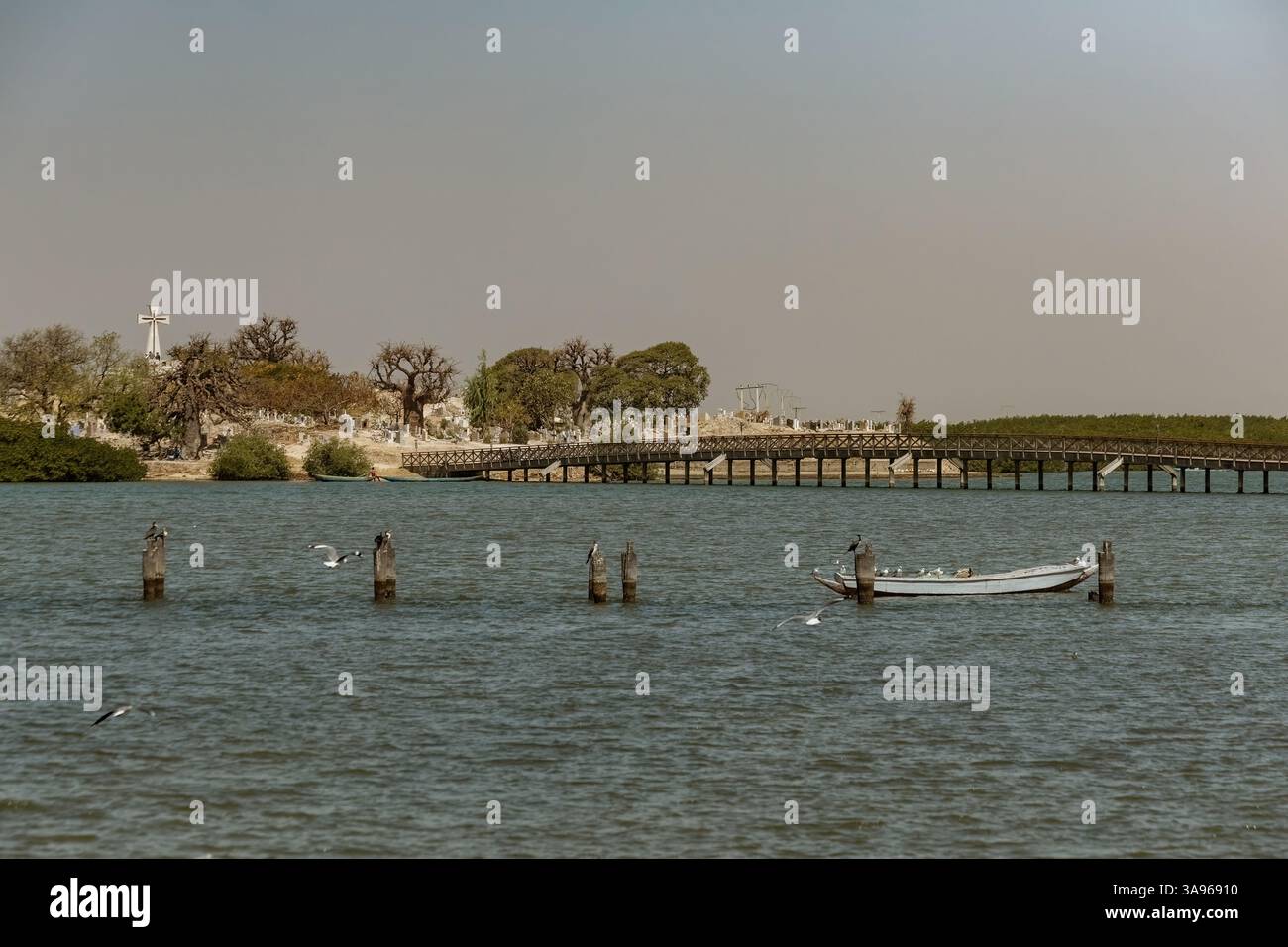 Fishing boats on the beach at Joal Fadiouth the shell island Senegal ...