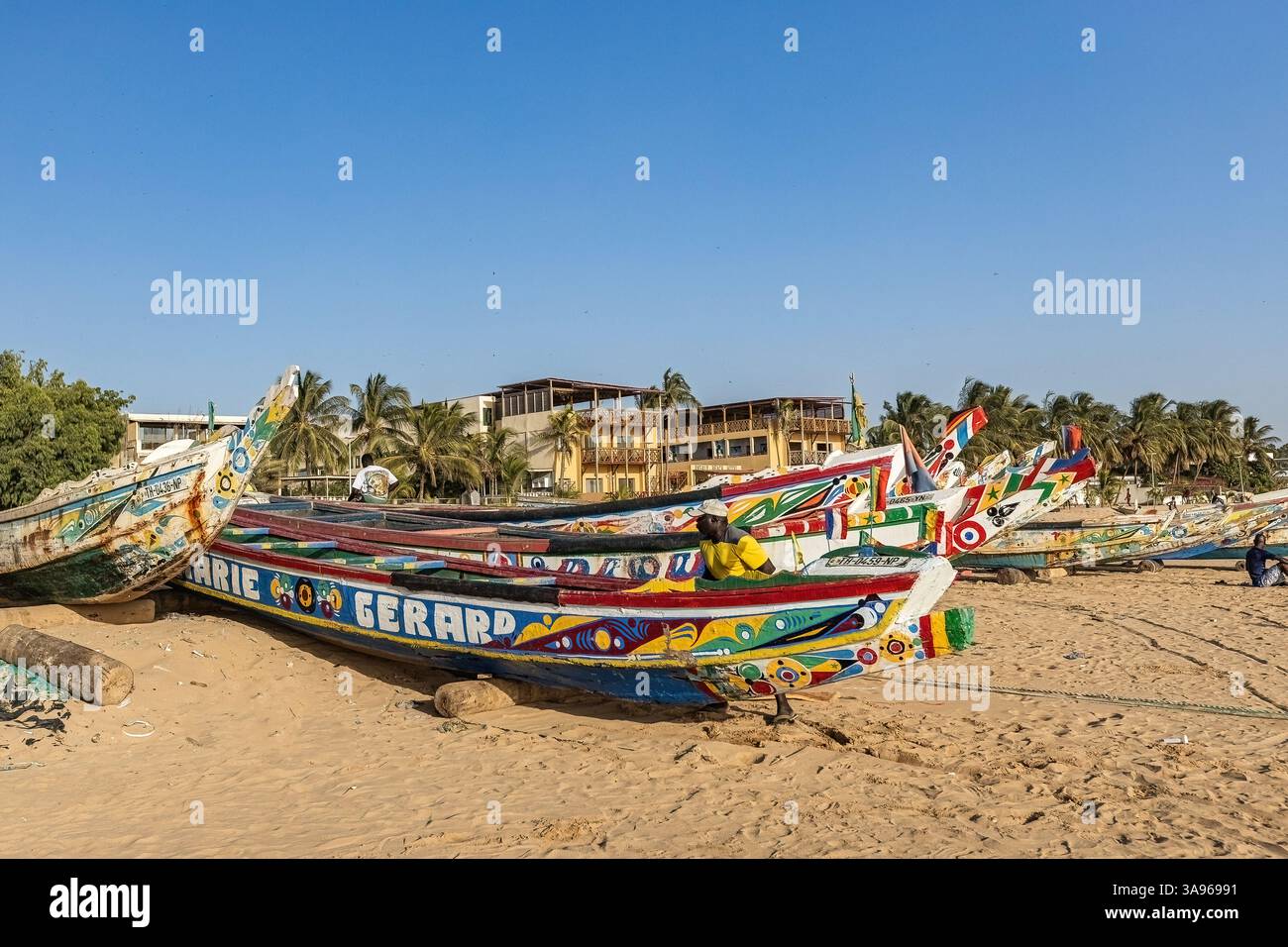 Boats on the beach at Mbour town in Senegal Stock Photo - Alamy