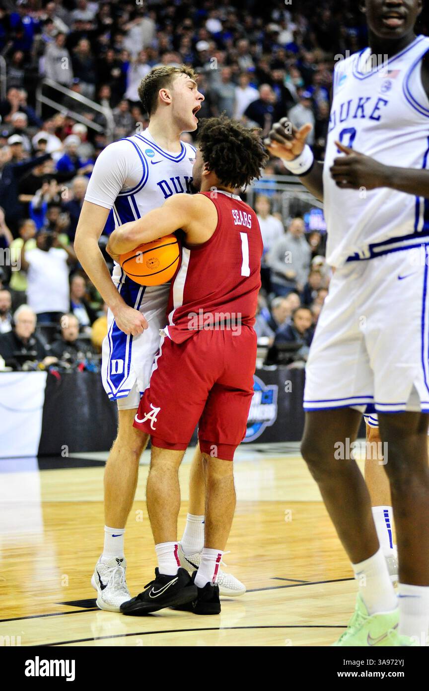 Newark, USA. 29th Mar, 2025. Duke's Cooper Flagg (2) and Alabama's Mark ...