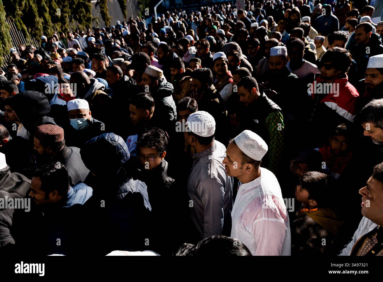 Dozens of people during a prayer on the last day of Ramadan, at the ...