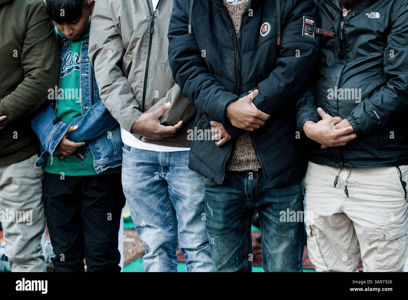 Men pray on the last day of Ramadan at the Casino de la Reina park on ...
