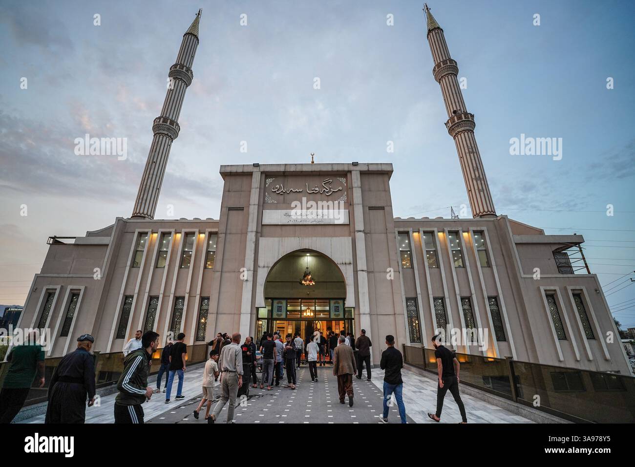 Iraqi Kurdish Muslims enter Saido mosque to perform Eid al-Fitr prayers ...