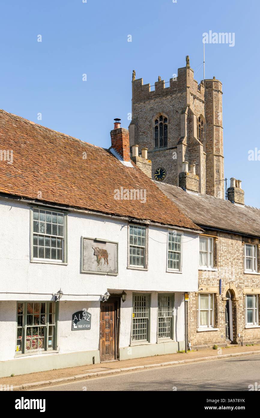 Historic buildings former Olde Bull Hotel Inn and tower of church of ...