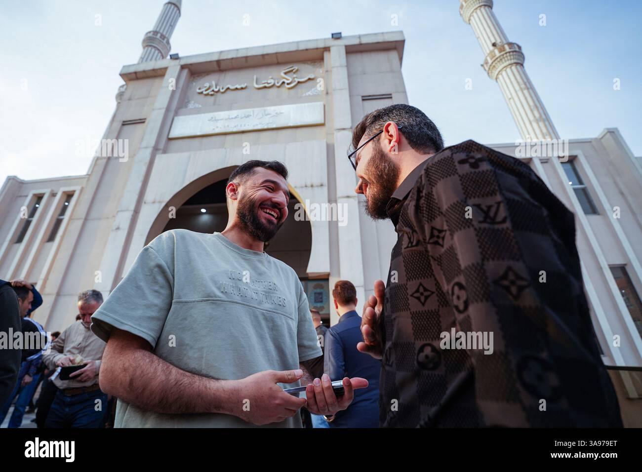 Iraqi Kurdish Muslims exchange greetings after Eid al-Fitr prayers at ...