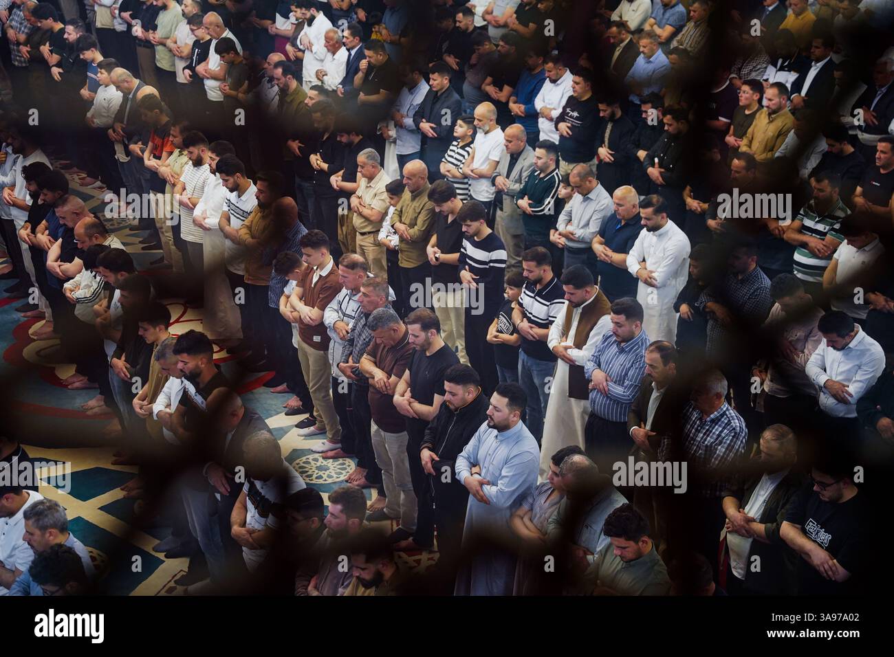 Dohuk, Iraq. 30th Mar, 2025. Iraqi Kurdish Muslims perform Eid al-Fitr ...