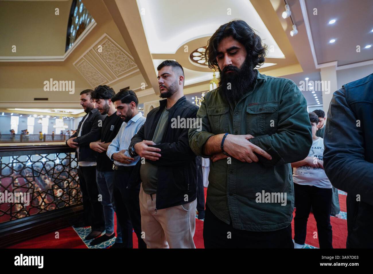 Dohuk, Iraq. 30th Mar, 2025. Iraqi Kurdish Muslims perform Eid al-Fitr ...