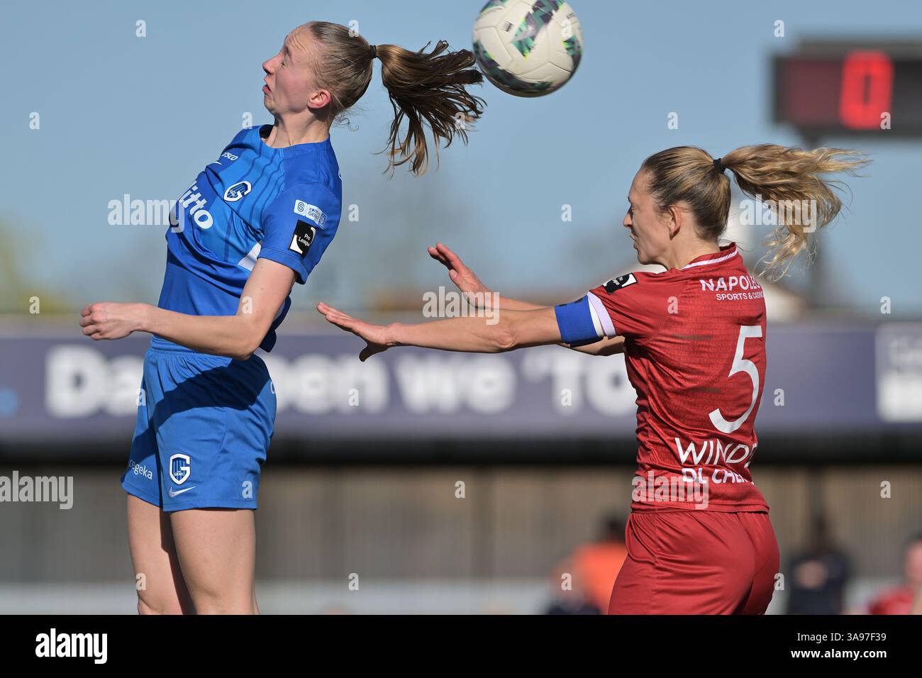 Lisa Petry (9) of Genk and Pauline Windels (5) of Zulte-Waregem ...
