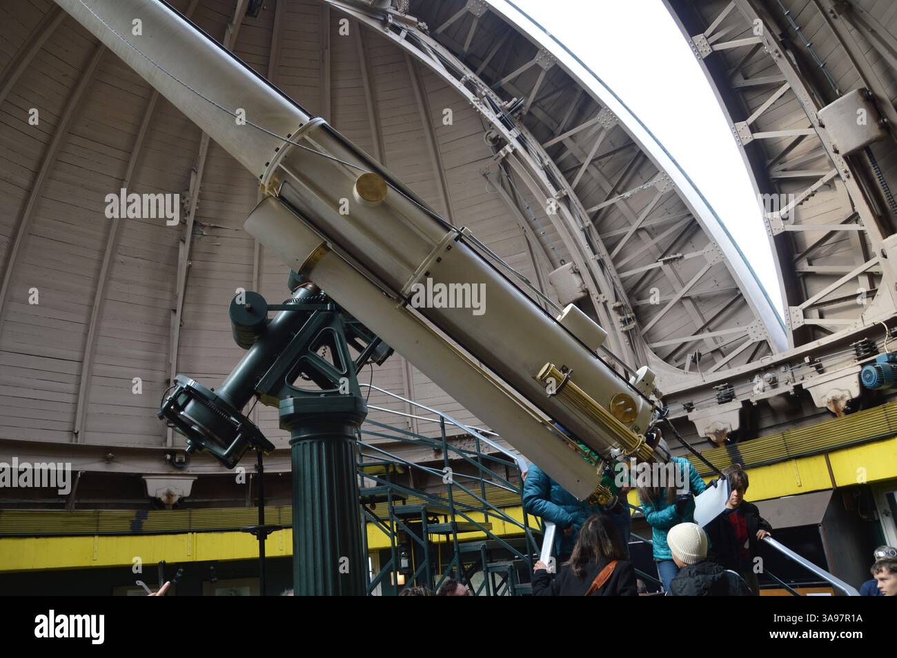 Berlin, Germany - March 28, 2025 - People watching a partial solar ...
