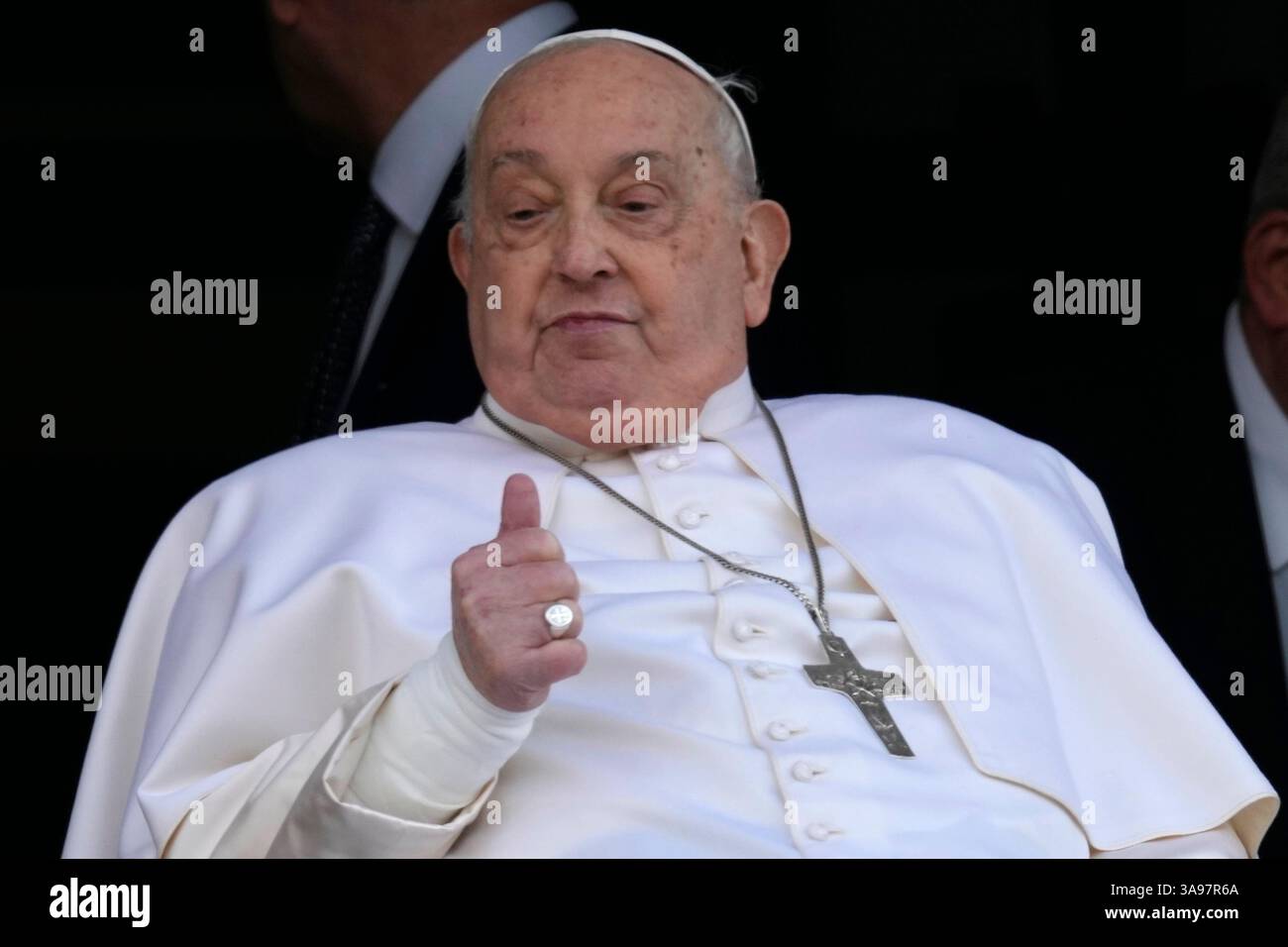 Pope Francis thumbs up as he appears at a window of the Agostino ...