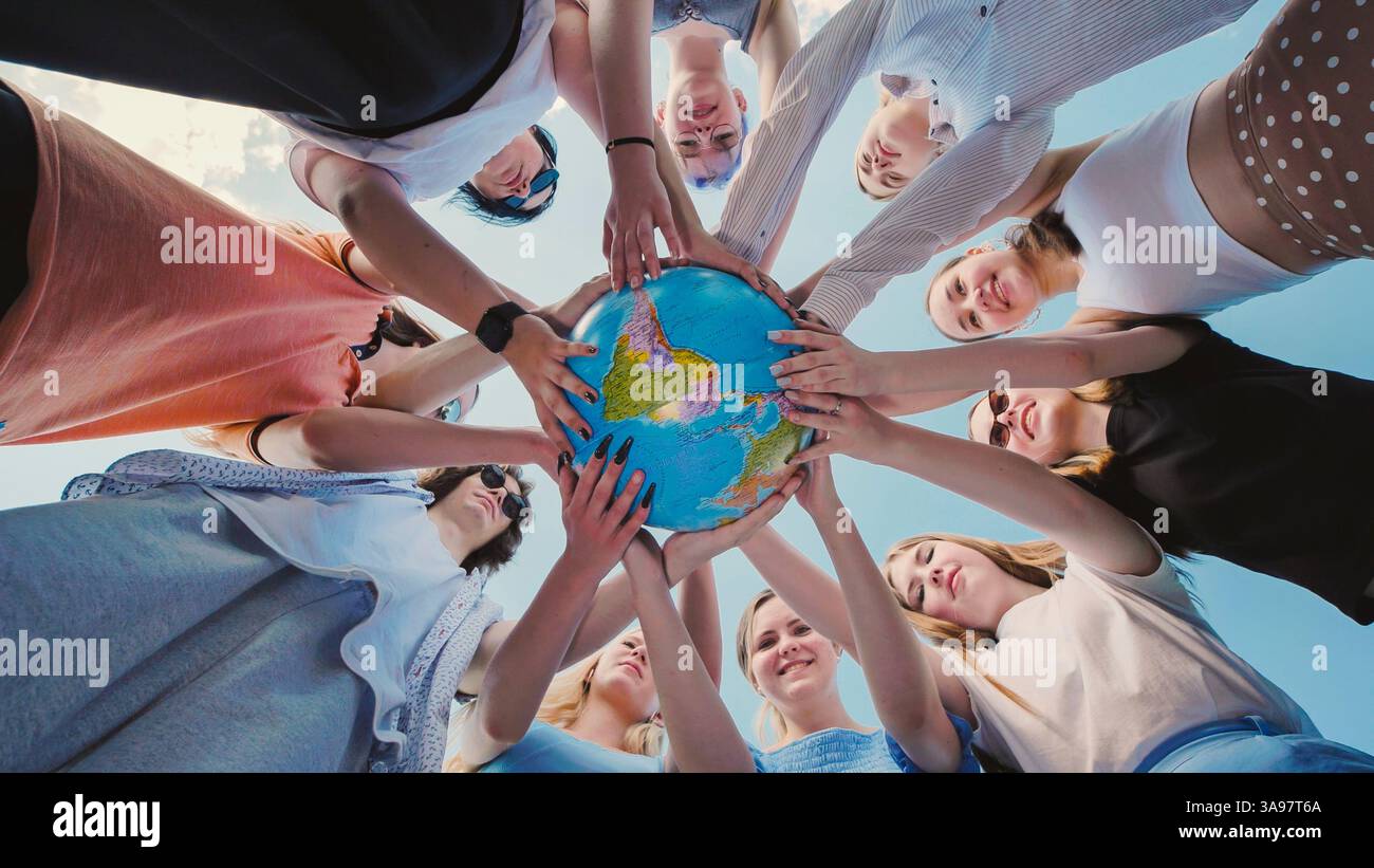Schoolgirls demonstrating their dedication to environmental protection ...