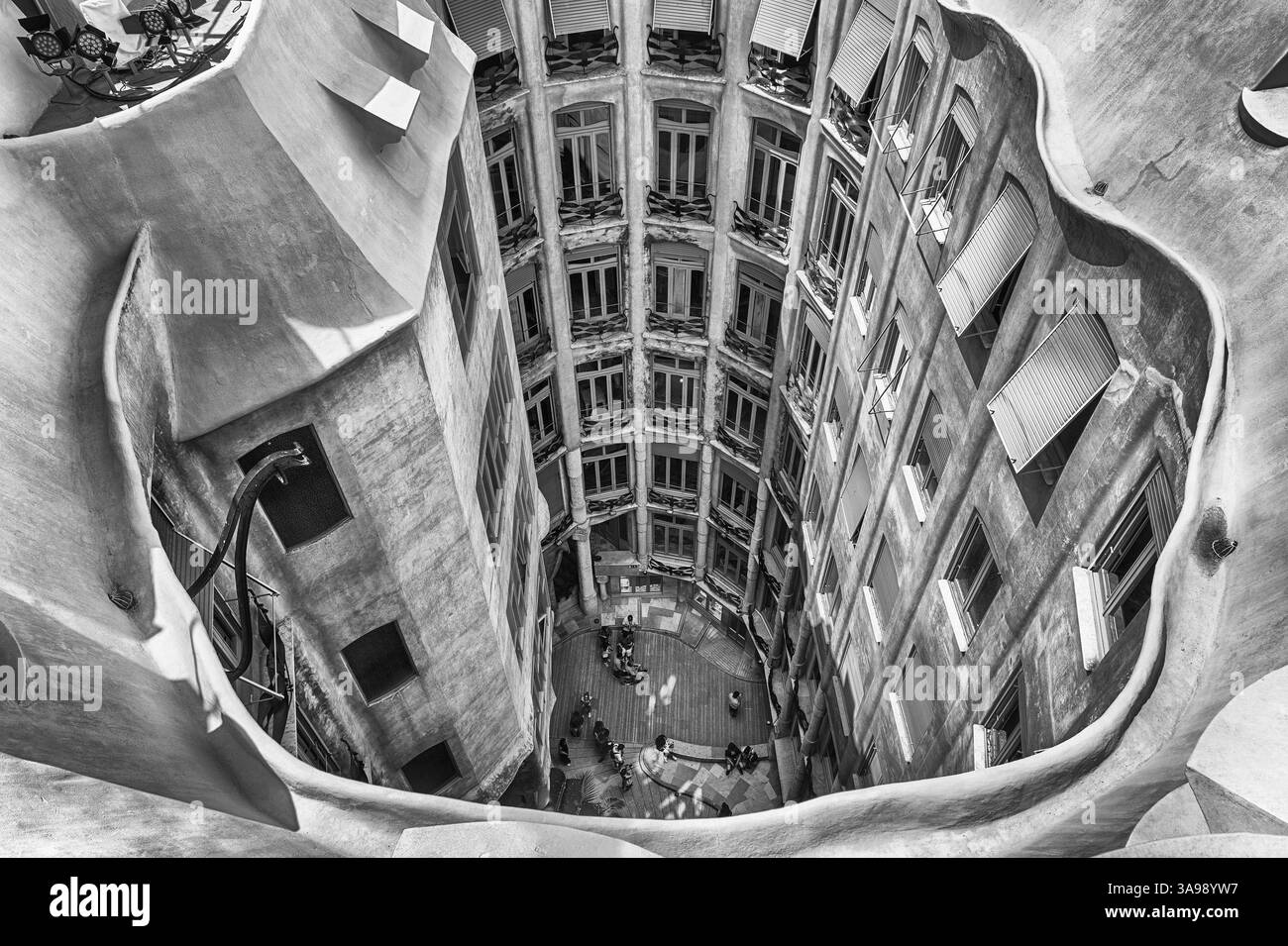 BARCELONA - AUGUST 9: Looking down at the inner courtyard of Casa Mila ...