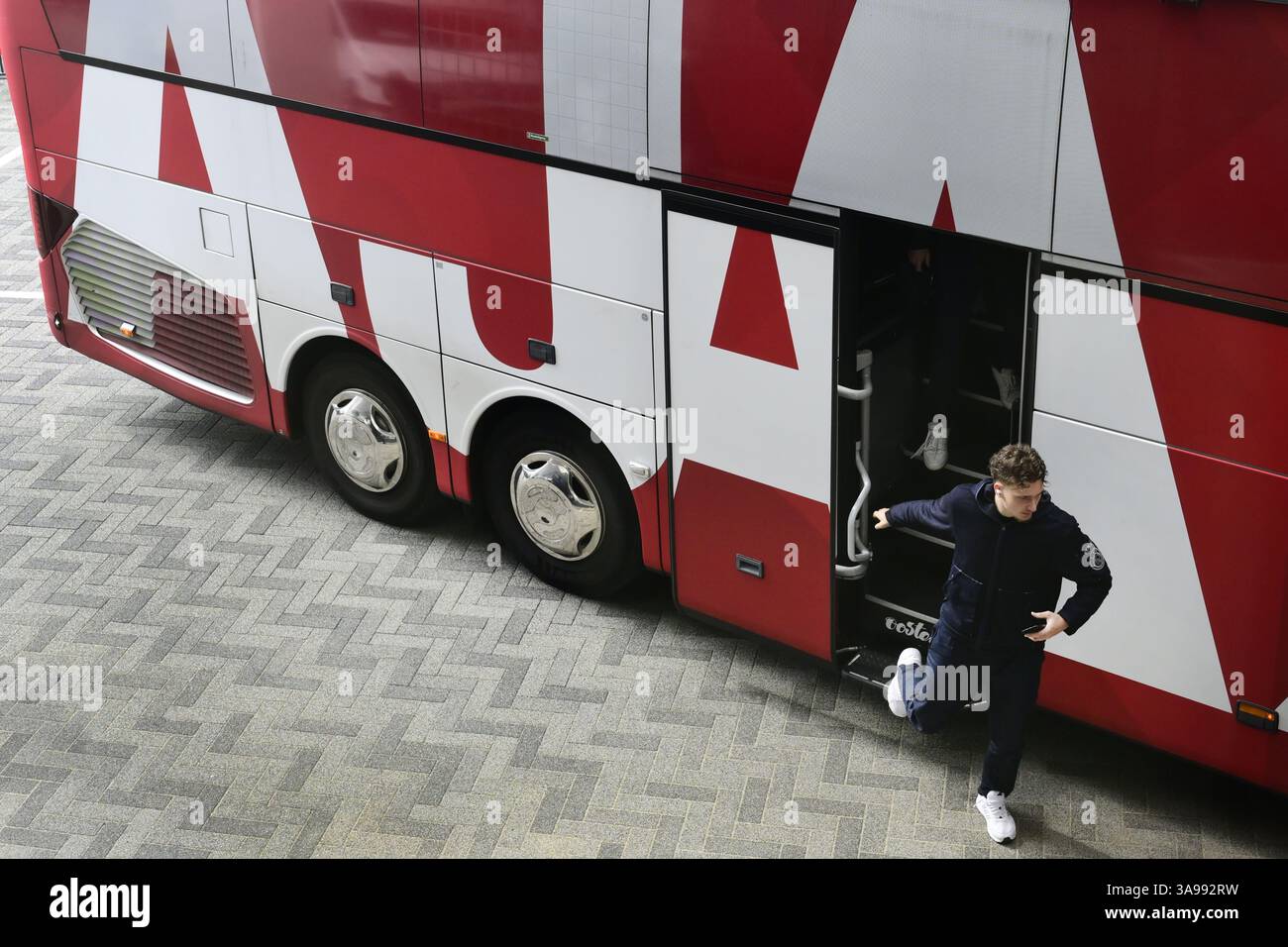 EINDHOVEN - Mika Godts of Ajax steps off the Ajax bus arrives for Dutch ...
