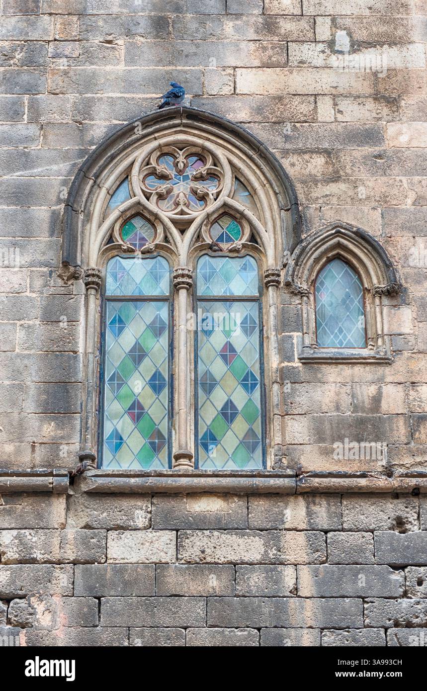 Medieval window of Palau Reial Major in Placa del Rei, public square of ...