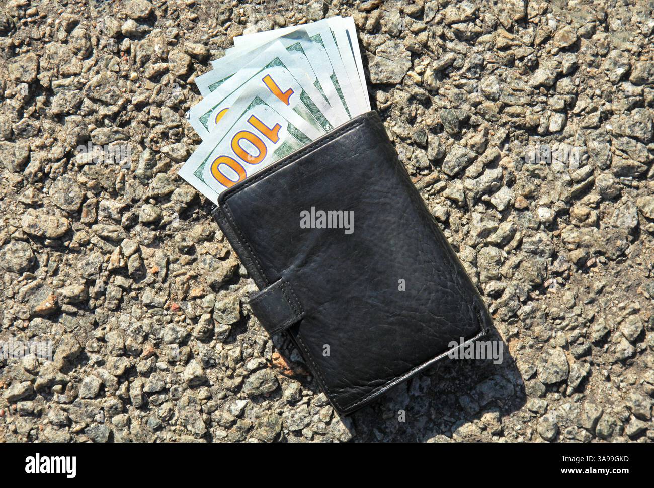 A lost wallet or purse with money. An accidentally left wallet with ...