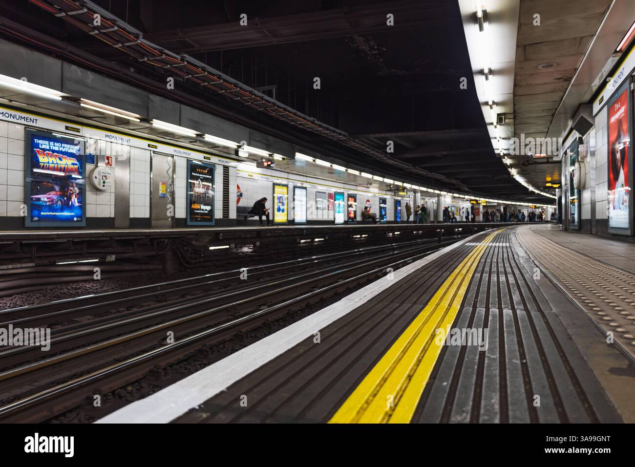London Underground Subway Platform with Yellow Safety Line and Tracks ...
