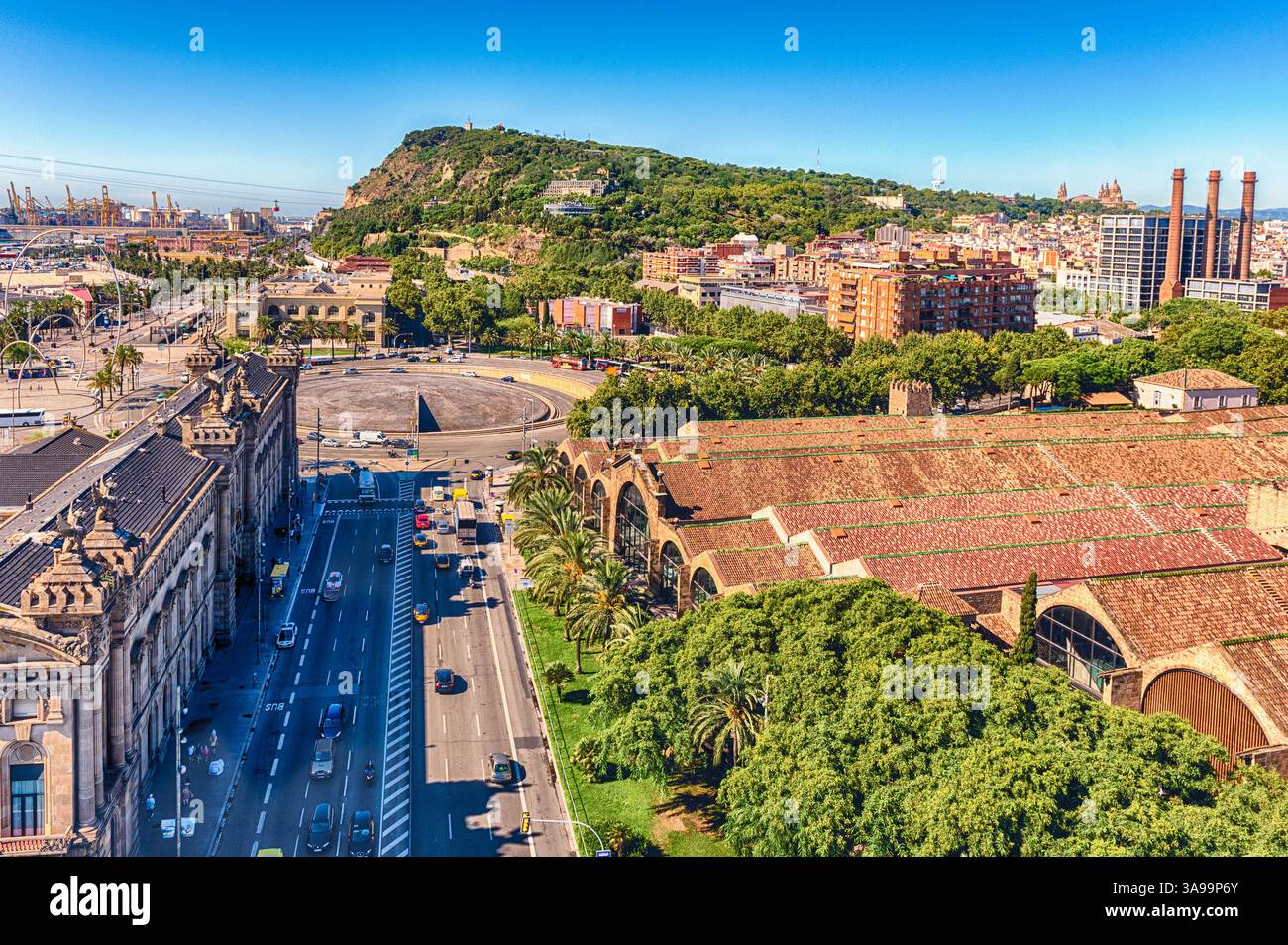 Scenic aerial view with Montjuic mountain in background from the top of ...